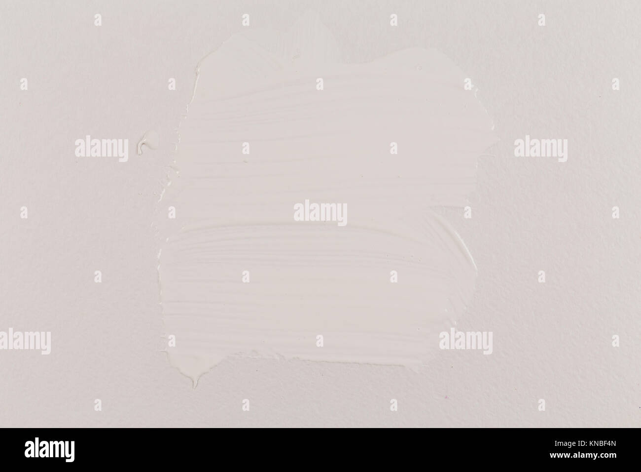 White paint on paper close up image shot background Stock Photo - Alamy