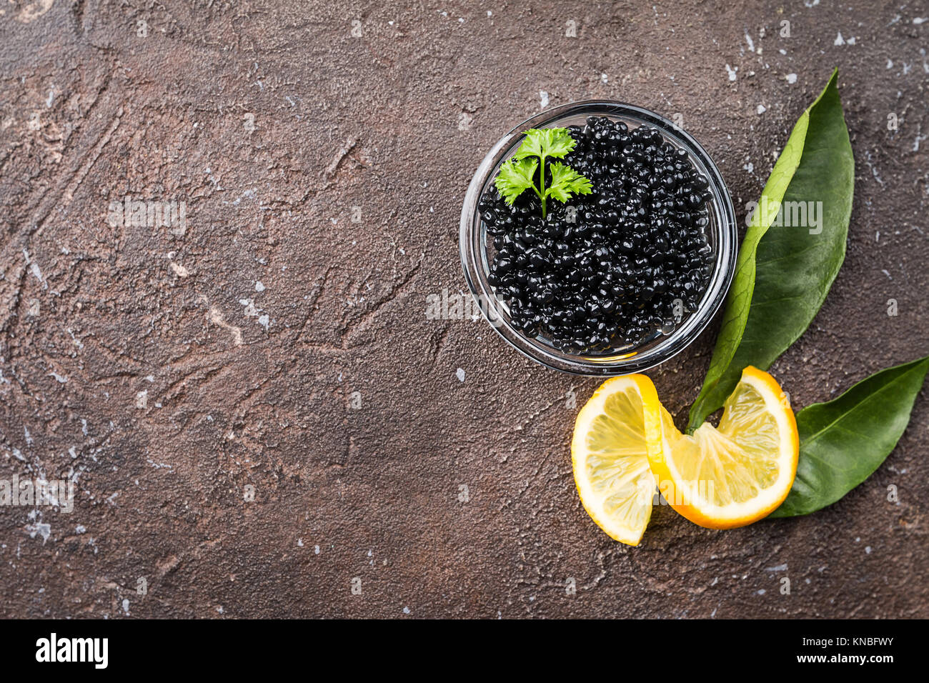 Black caviar on ice Stock Photo - Alamy
