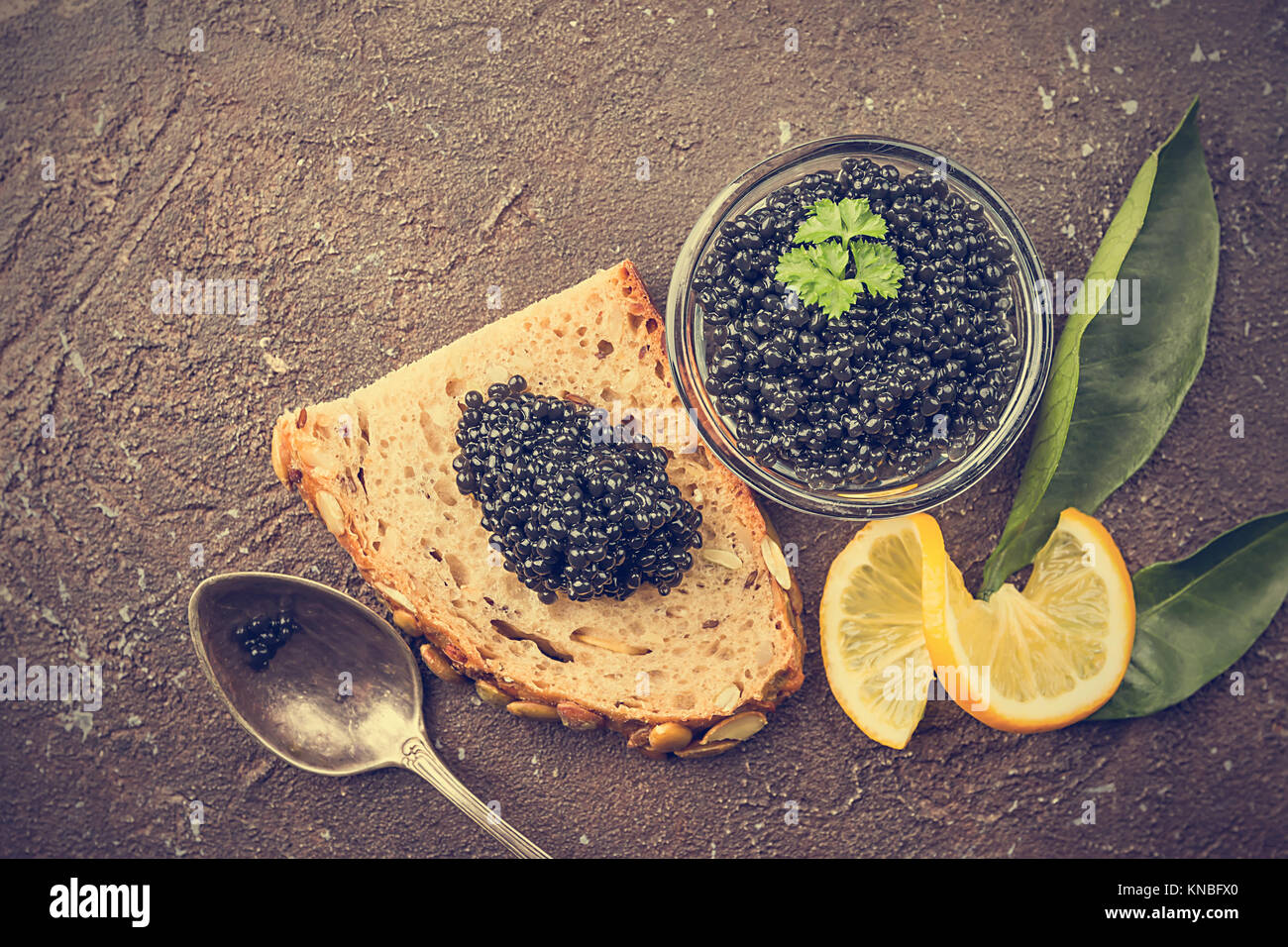 Black caviar on ice Stock Photo - Alamy