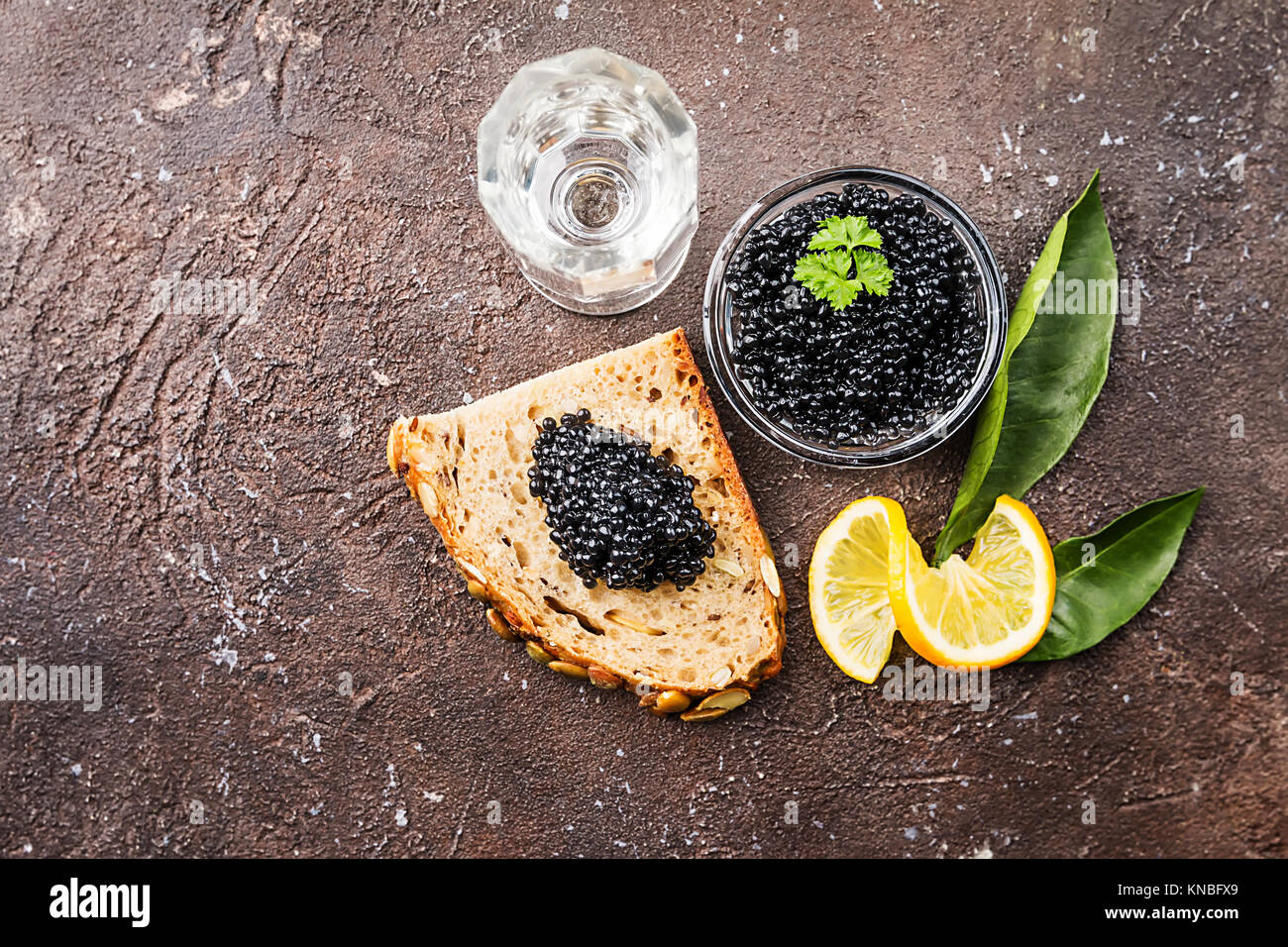 Black caviar on ice Stock Photo - Alamy