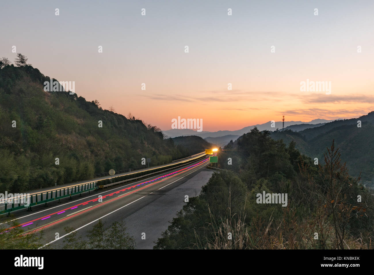 modern highway through mountains in city of China Stock Photo - Alamy