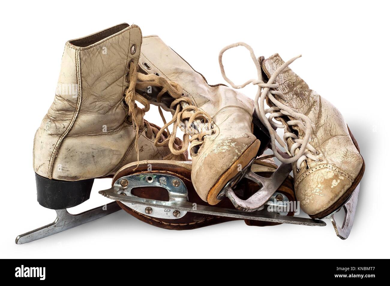 Pile of old female skates isolated on white background Stock Photo - Alamy