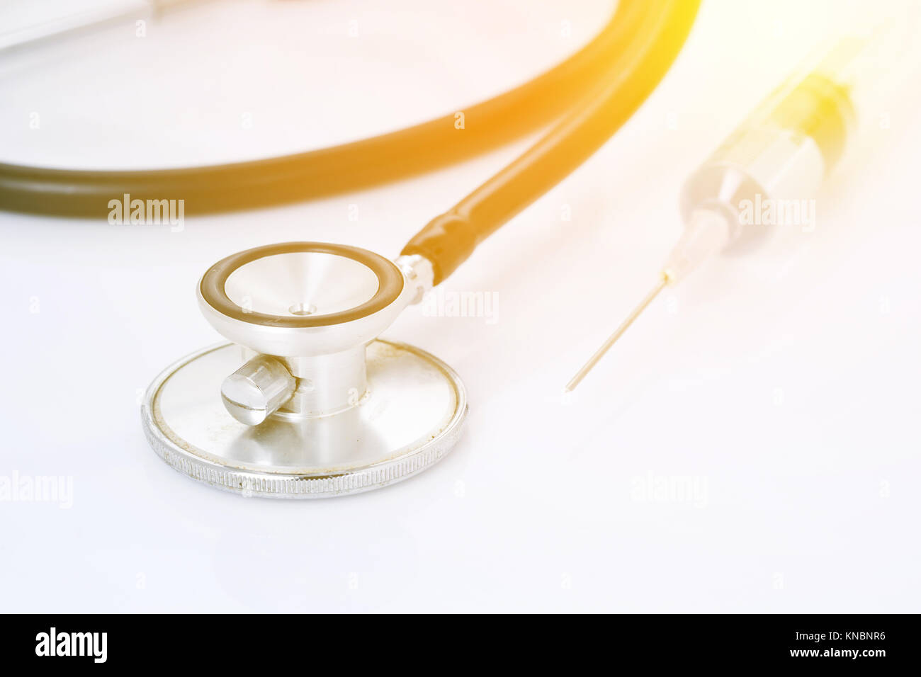 Stethoscope with syringe Stock Photo - Alamy