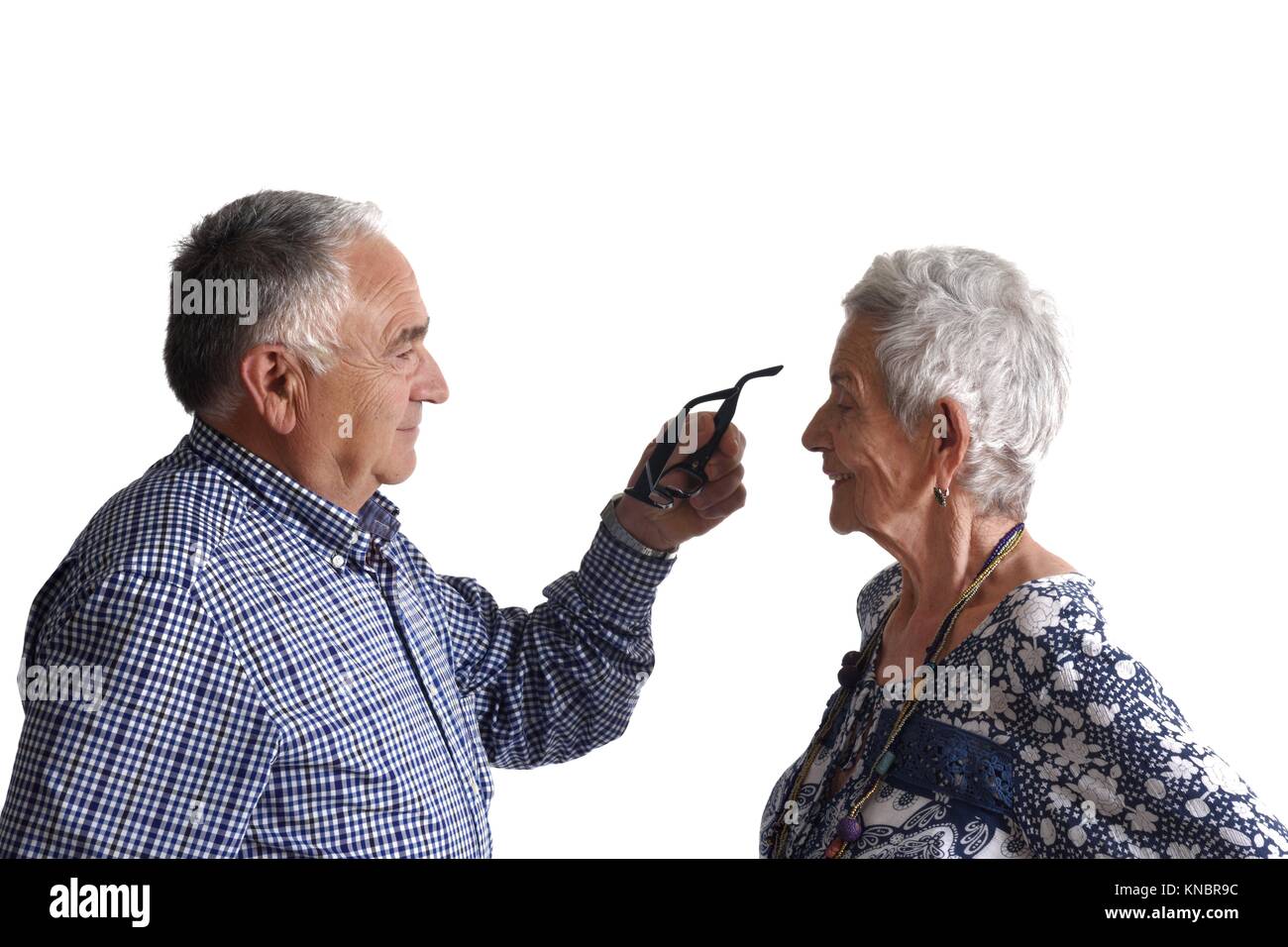 Senior put on glasses hi-res stock photography and images - Alamy