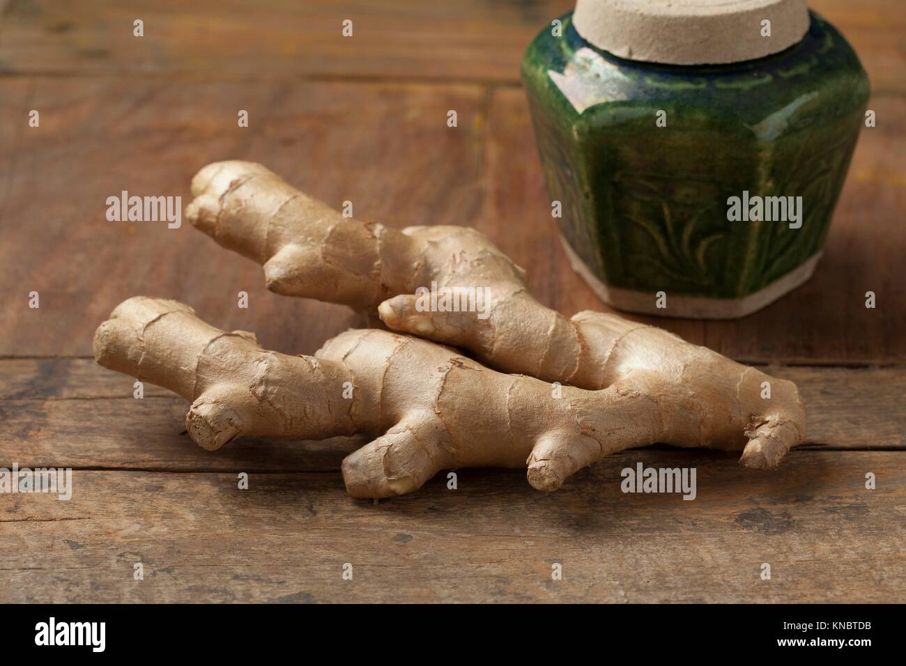 Fresh ginger root and a heirloom chinese ginger pot Stock Photo - Alamy