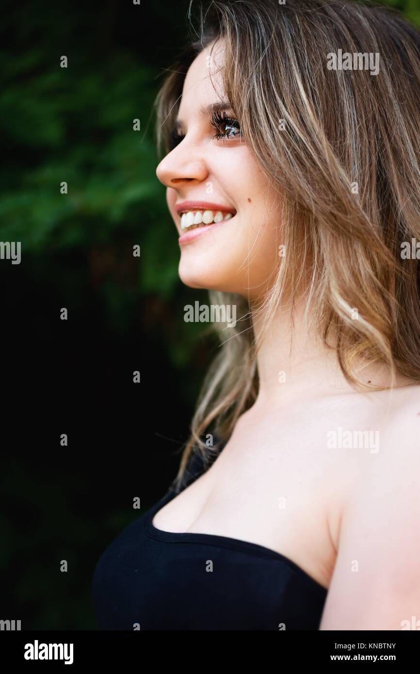 Side profile beautiful woman smiling hi-res stock photography and ...