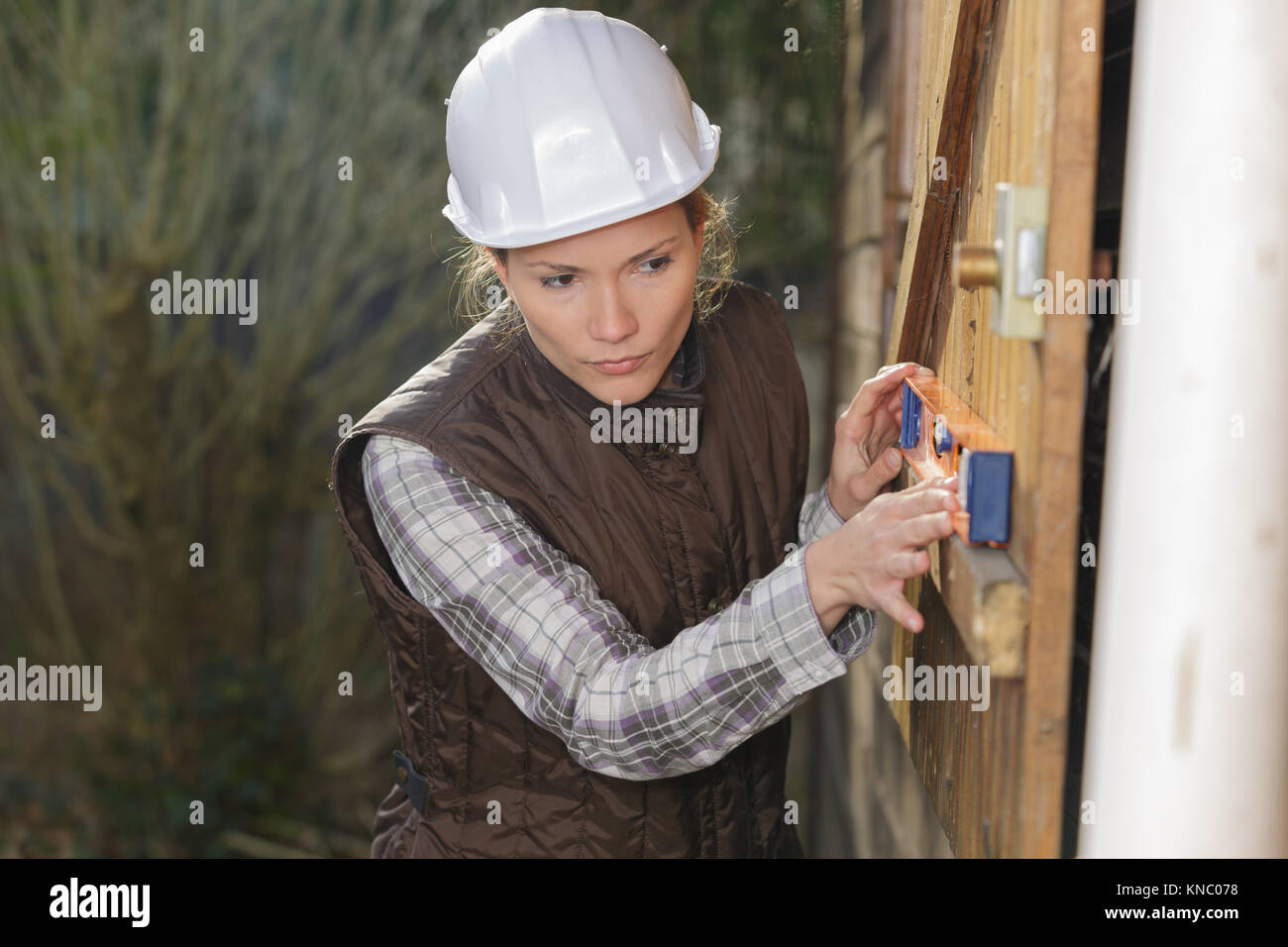 beautiful female carpenter at work using Stock Photo - Alamy