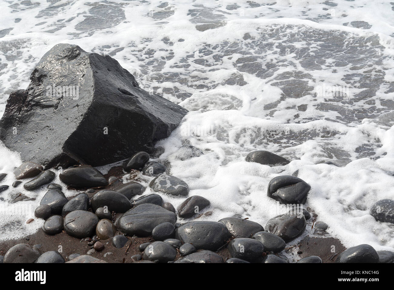 Beach with red sand. The island of Santorini. Volcanic rock, Greece ...