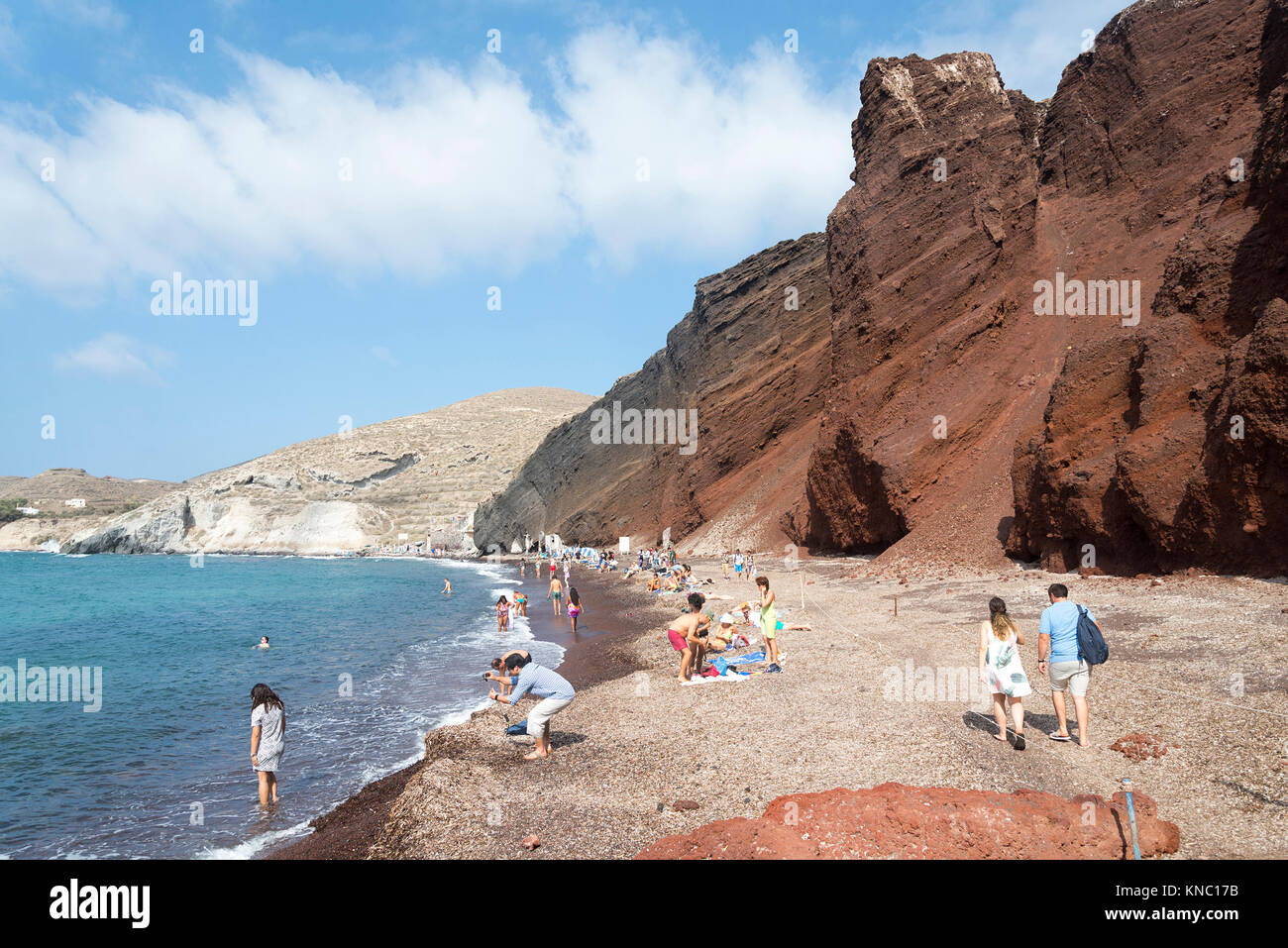 Beach with red sand. The island of Santorini. Volcanic rock, Greece ...