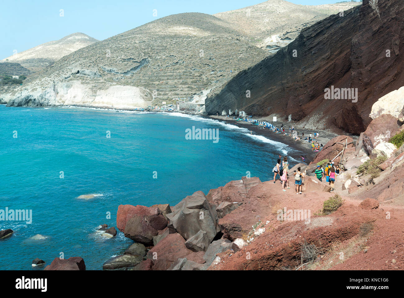 Beach with red sand. The island of Santorini. Volcanic rock, Greece ...