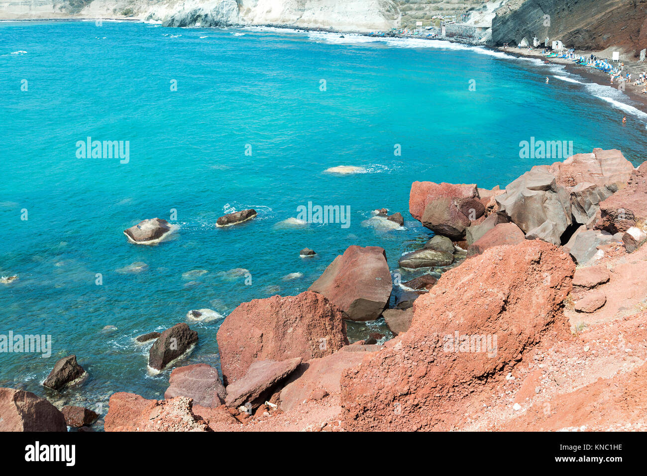 Beach with red sand. The island of Santorini. Volcanic rock, Greece ...