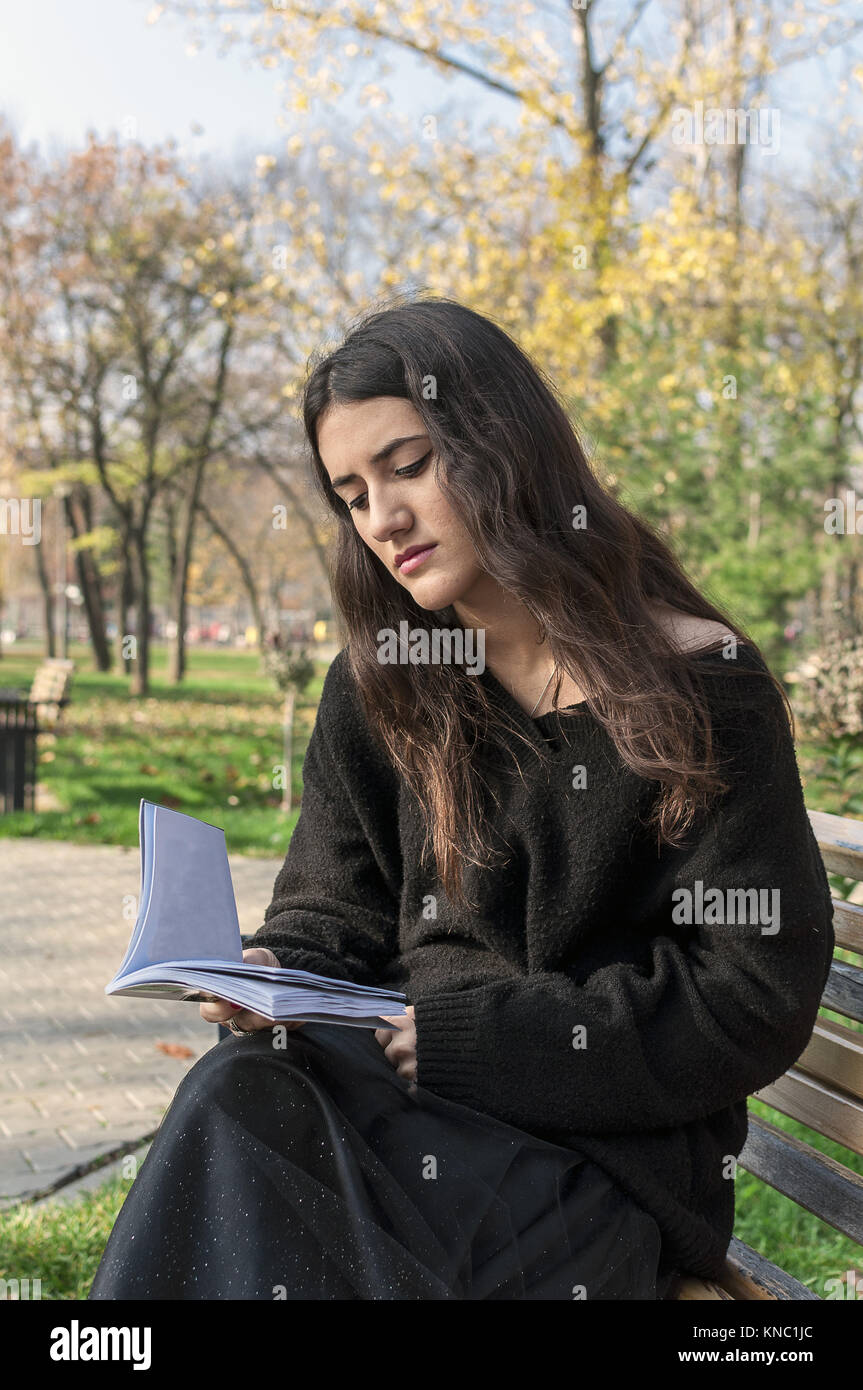 Female person reading book hi-res stock photography and images - Alamy