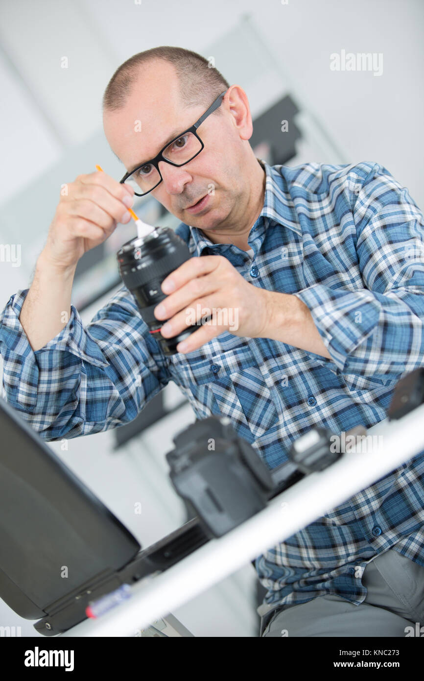 Person cleaning camera sensor hi-res stock photography and images - Alamy