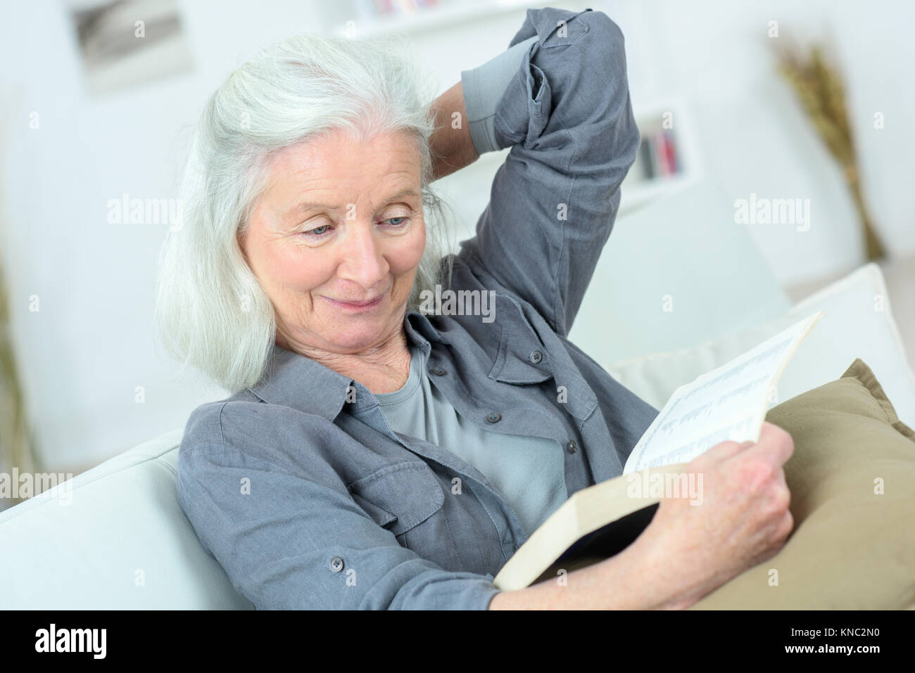 Retired Lady Reading A Paper High Resolution Stock Photography and ...