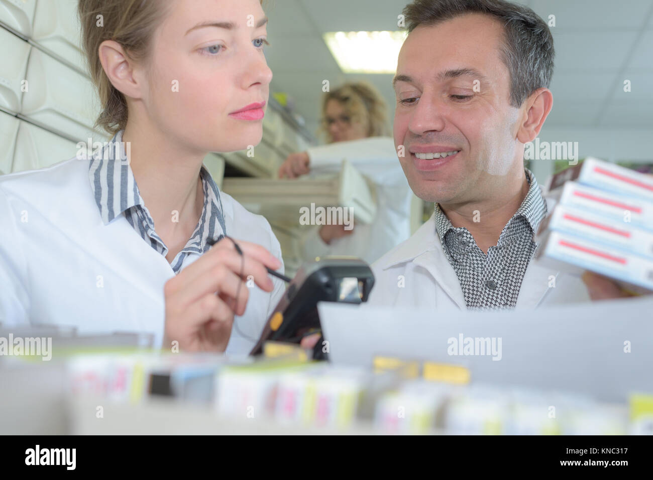pharmacist inspection and quality control staff Stock Photo - Alamy