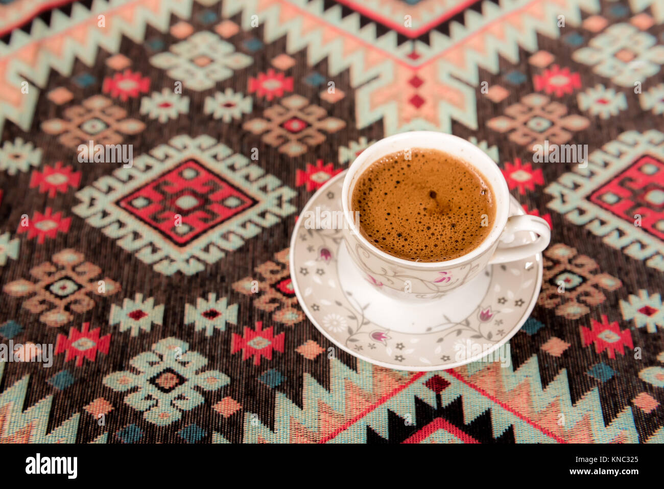 Top view of Traditional Turkish coffee cooked on embers is served in a ...