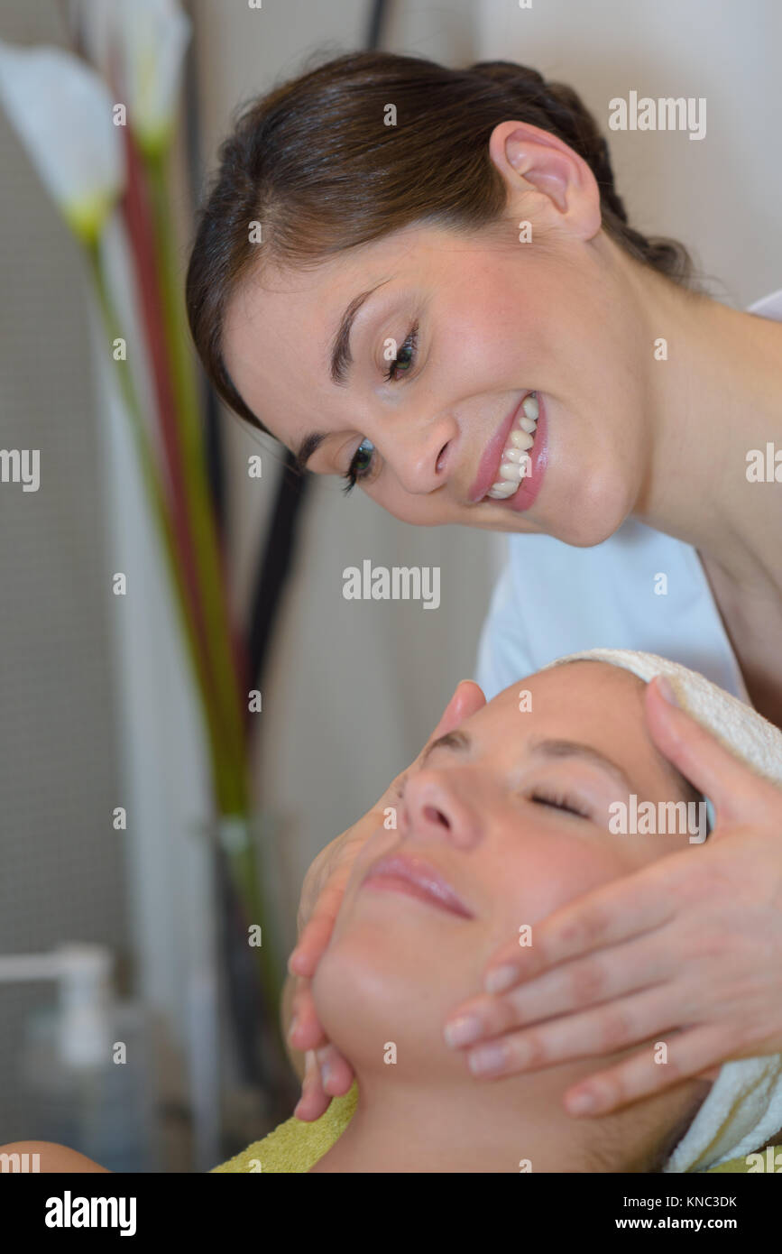 beautiful woman getting face treatment Stock Photo - Alamy
