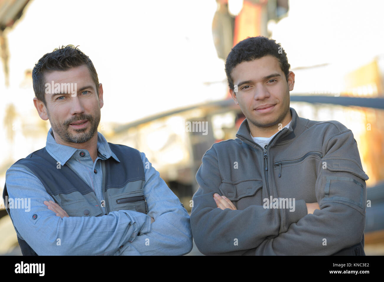 smiling european workers posing outdoor Stock Photo - Alamy