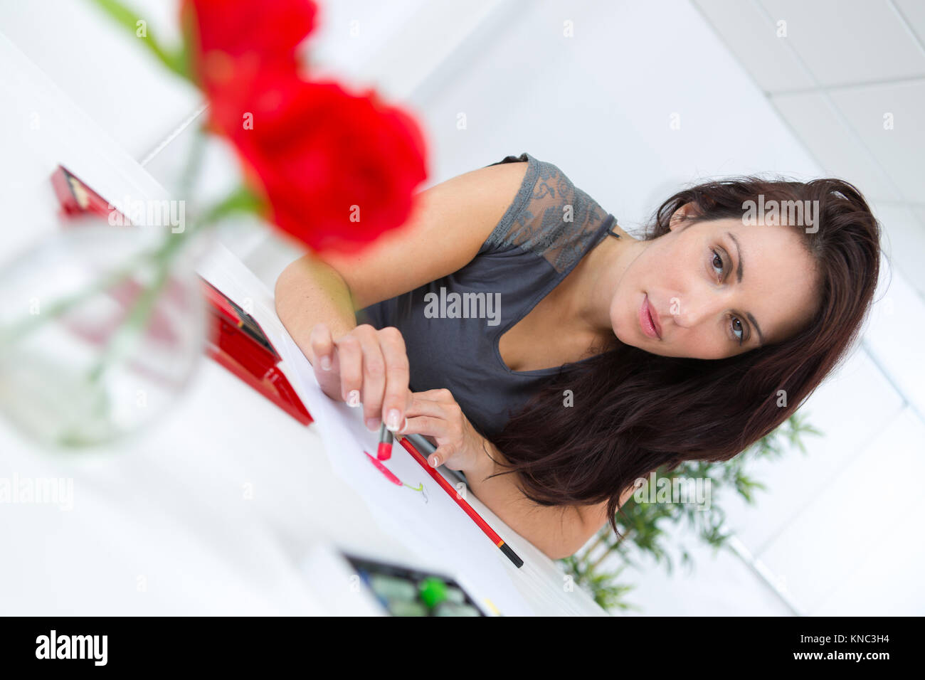woman copying the flower Stock Photo - Alamy