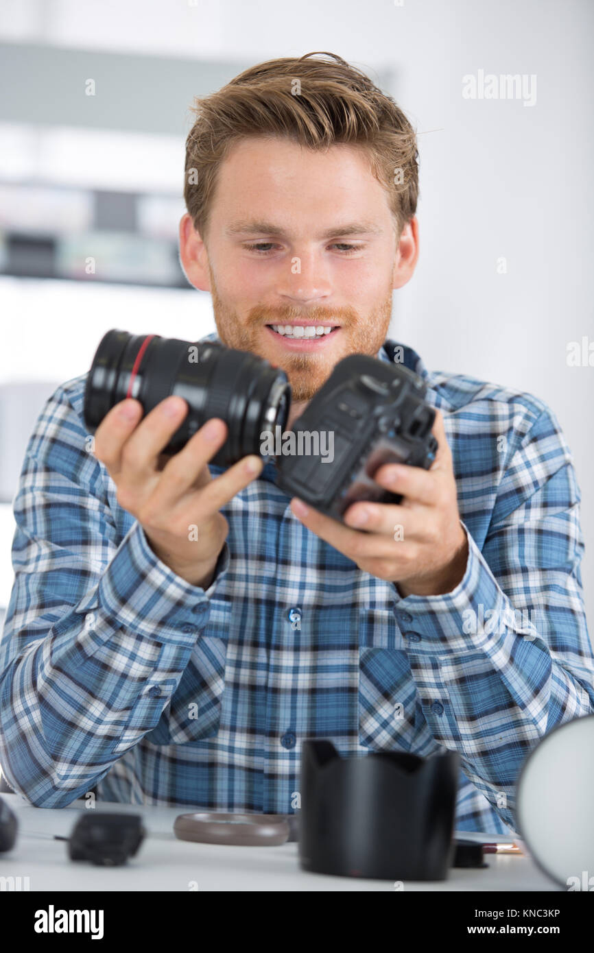 technician engineer assembling camera Stock Photo - Alamy