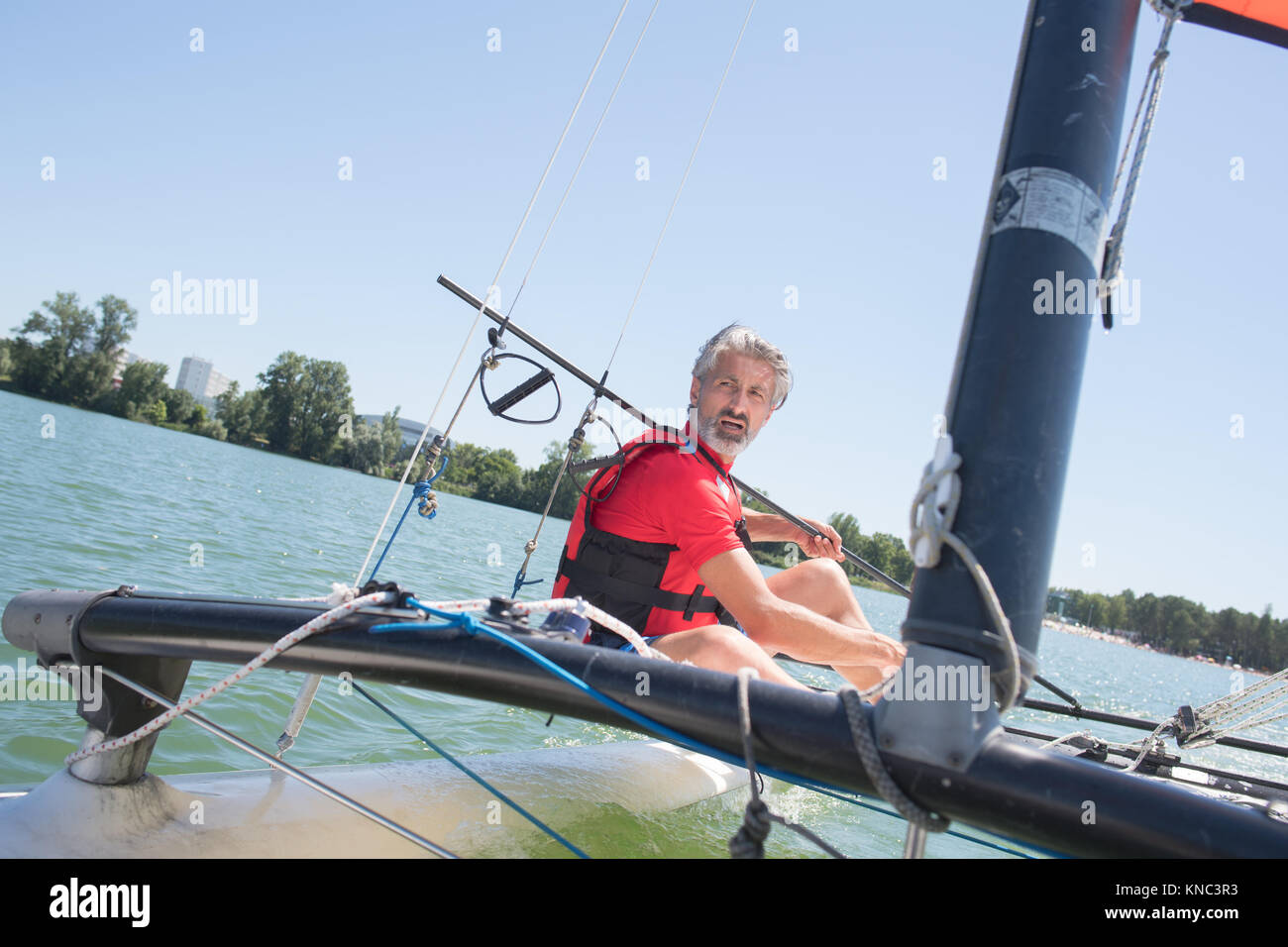 enjoying extreme sailing with racing sailboat Stock Photo - Alamy