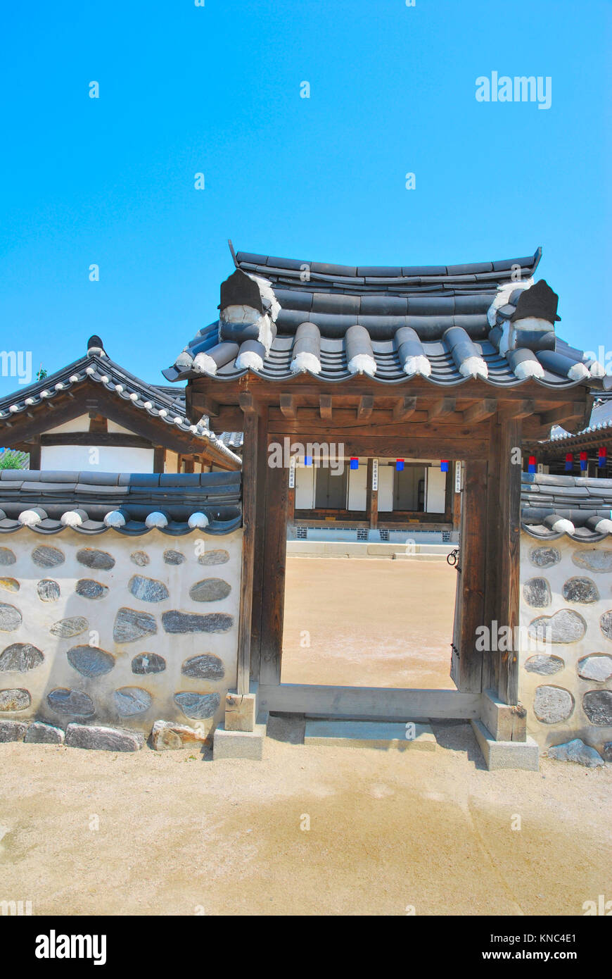 Korean temple side gate leading into main temple courtyard. Taken in ...