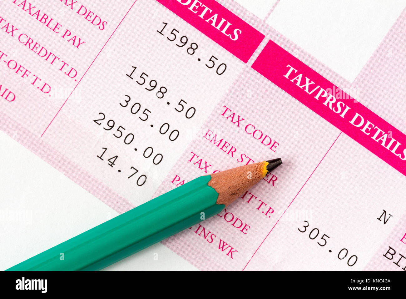 Salary or tax calculation concept with numbers on salary slips Stock ...