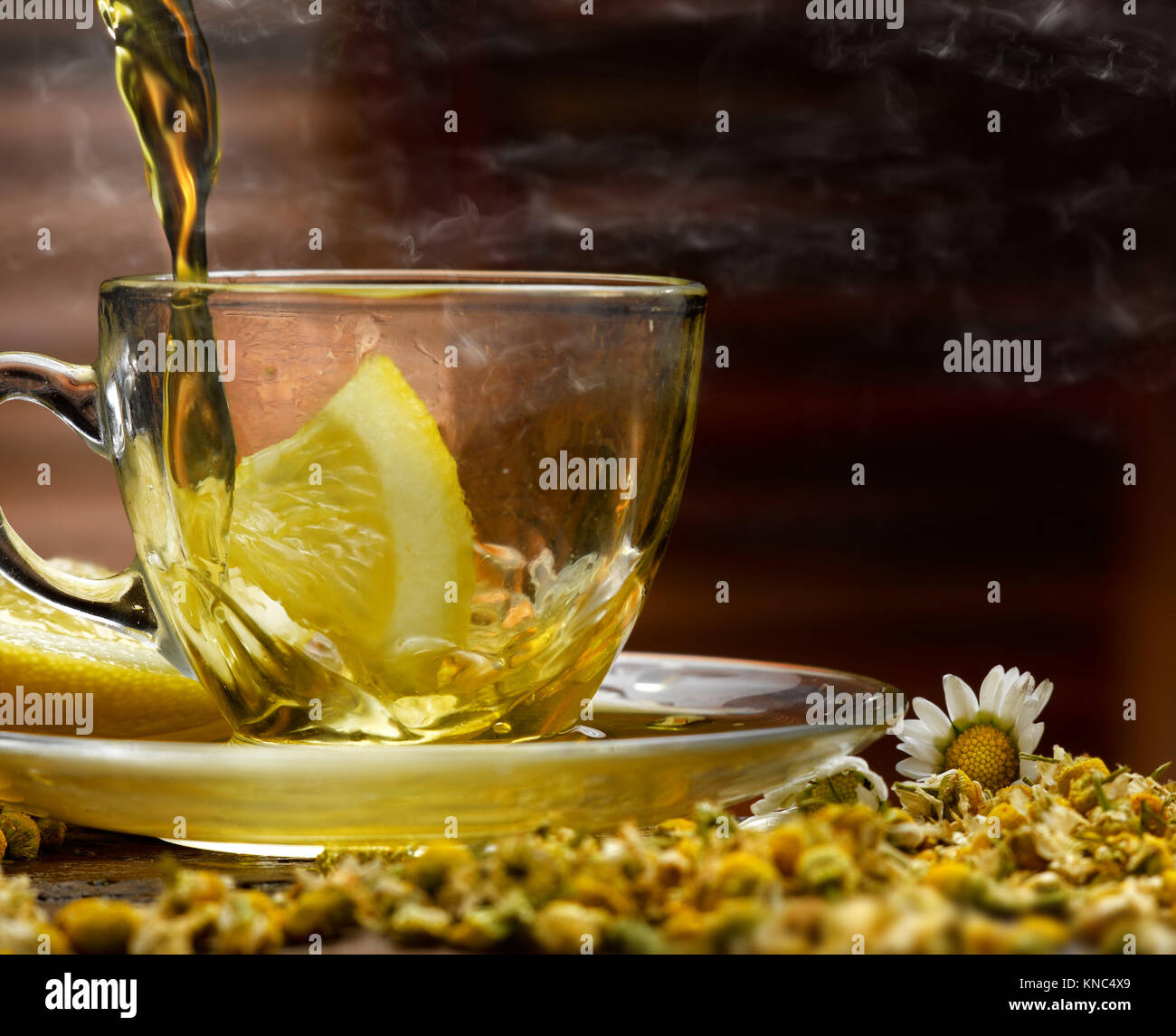 delicious chamomile infusion poured into a glass cup Stock Photo - Alamy