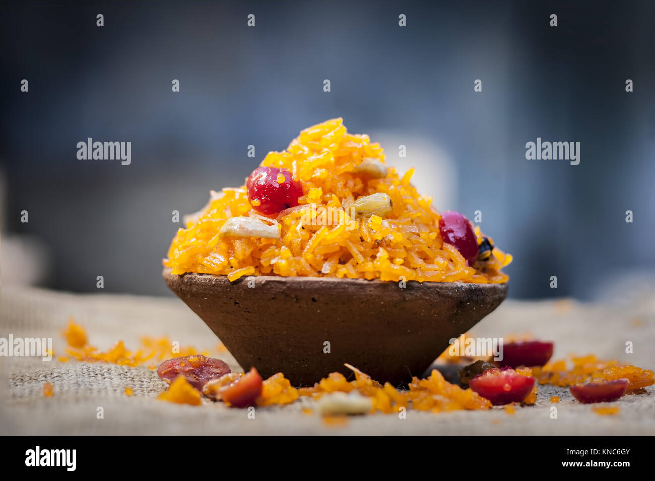 Indian sweet rice dish in a clay bowl on gunny background Stock Photo ...