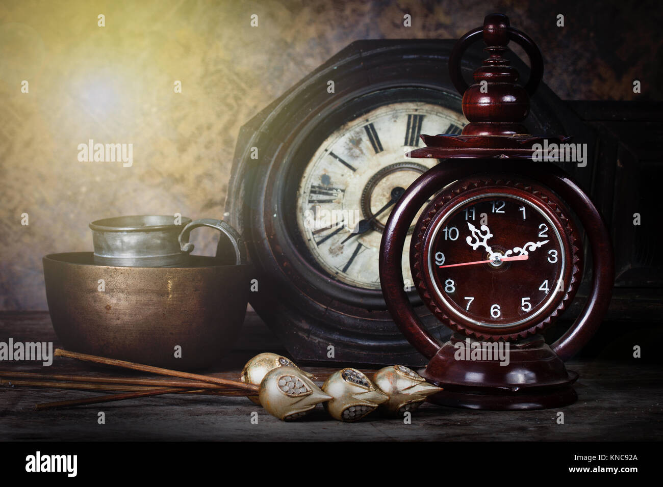 Group of objects on wood table. old clock, antique wooden clock ,Still ...