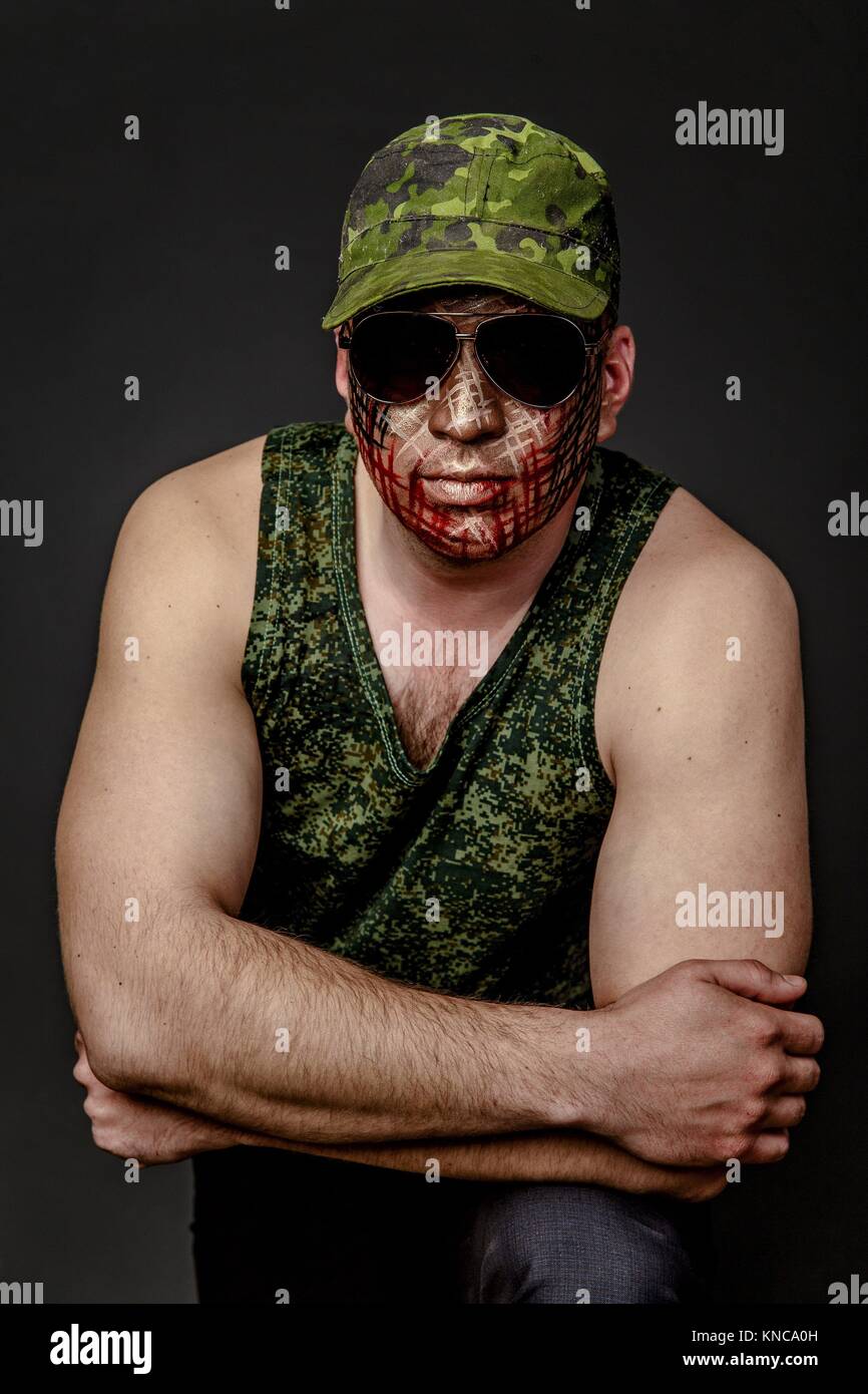 Portrait of Soldier with Military Style Camouflage on a Face. Portrait ...