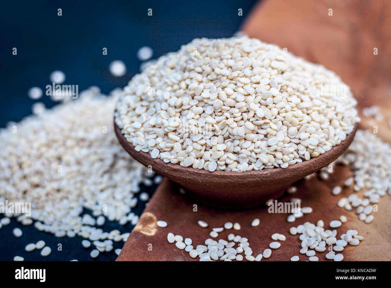 Vigna mungo,urad,Split Black gram, in a clay bowl Stock Photo - Alamy