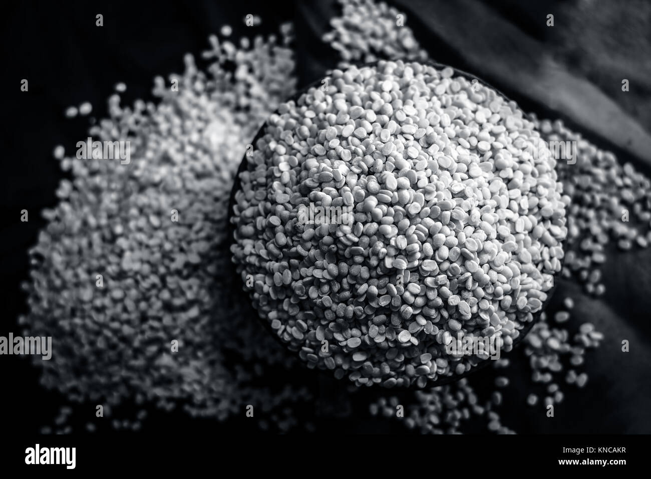 Vigna mungo,urad,Split Black gram, in a clay bowl Stock Photo - Alamy