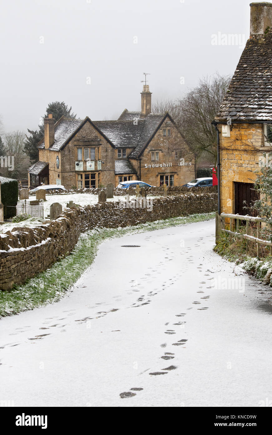 Snowshill arms pub in Snowshill village in the snow in December ...