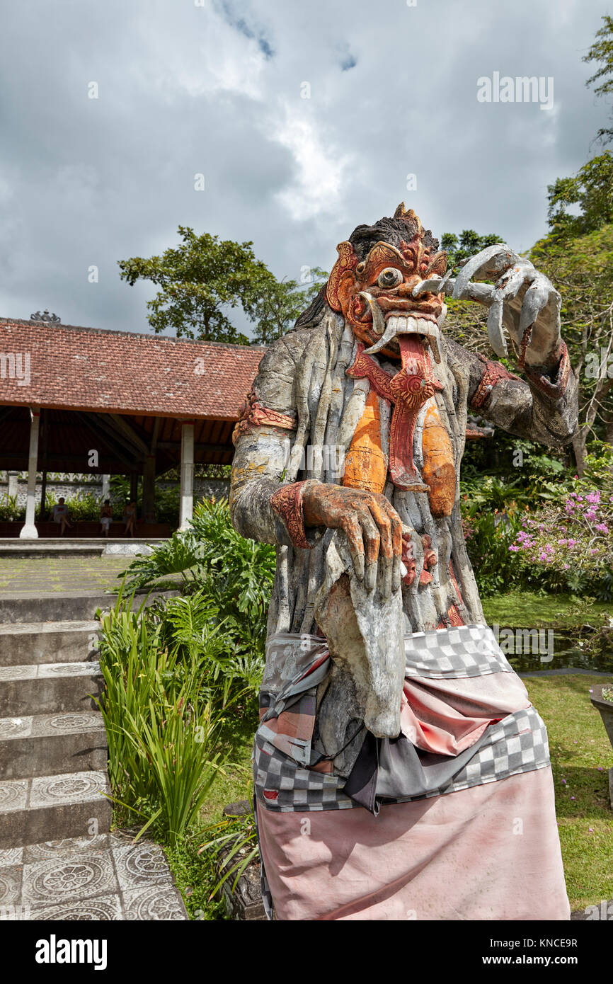 Statue of Rangda, the demon queen, in the Tirta Gangga water palace ...