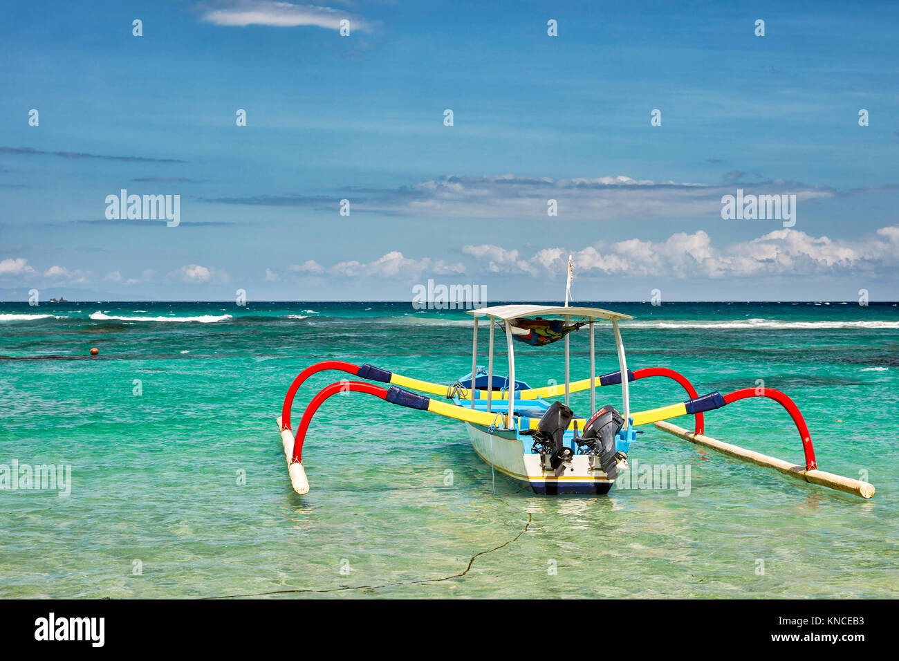 Indonesian outrigger canoe, also known as jukung or cadik moored in ...