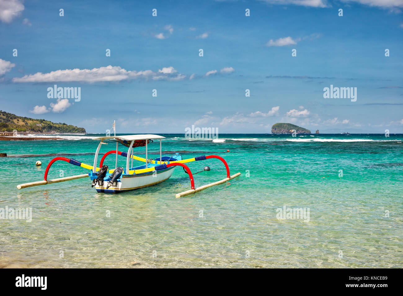 Indonesian outrigger canoe, also known as jukung or cadik moored in ...