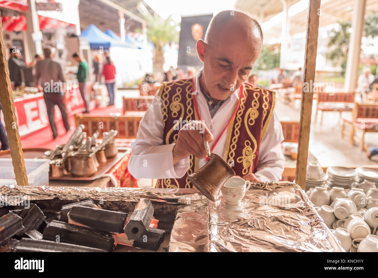 Unidentified Turkish man in a Small coffee shop cooks "Turkish Coffee ...