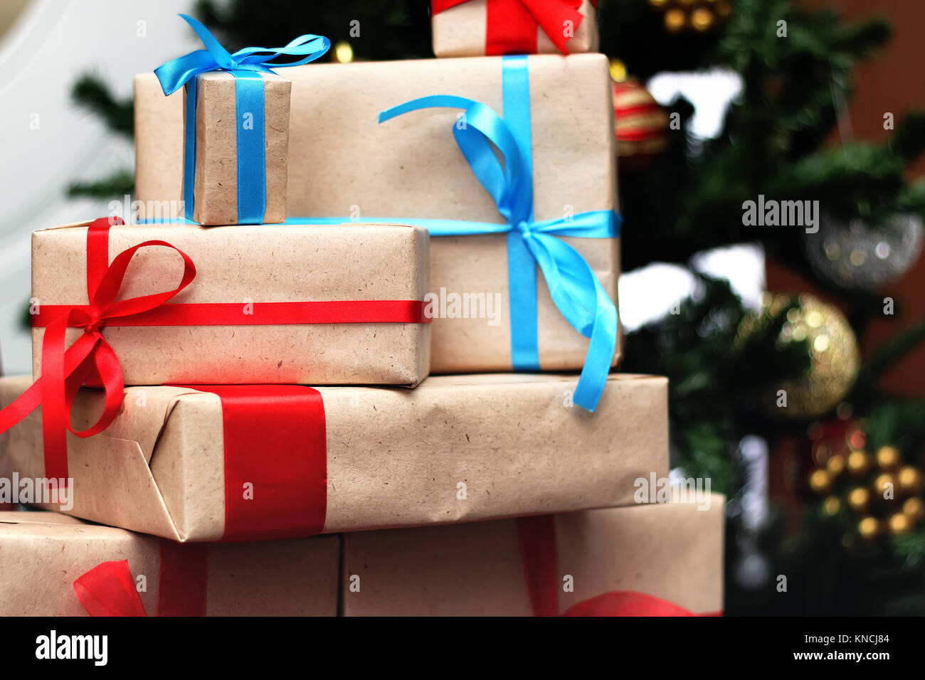 gift under tree christmas ball Stock Photo - Alamy