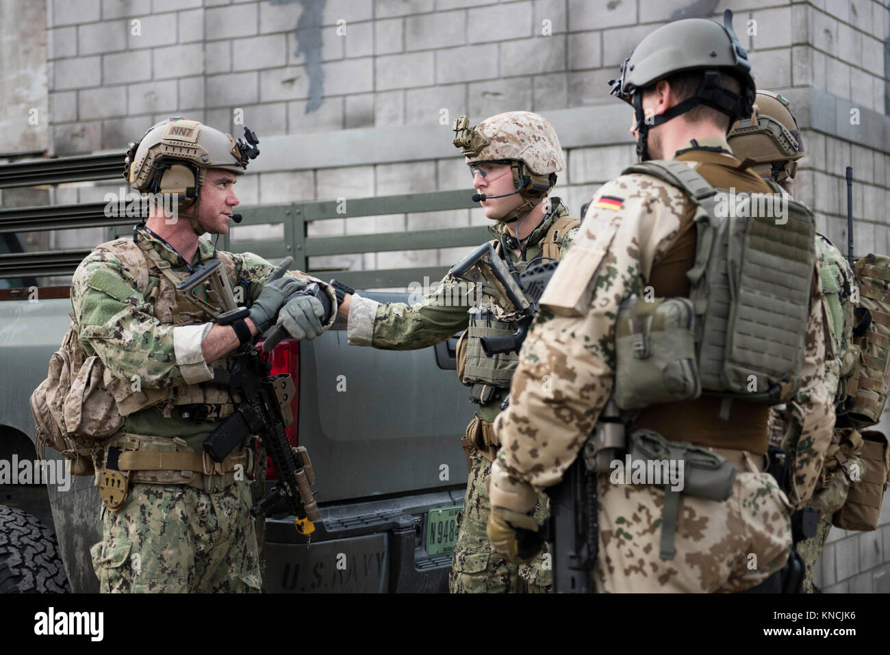 U.S. Navy and German Navy explosive ordnance disposal technicians ...
