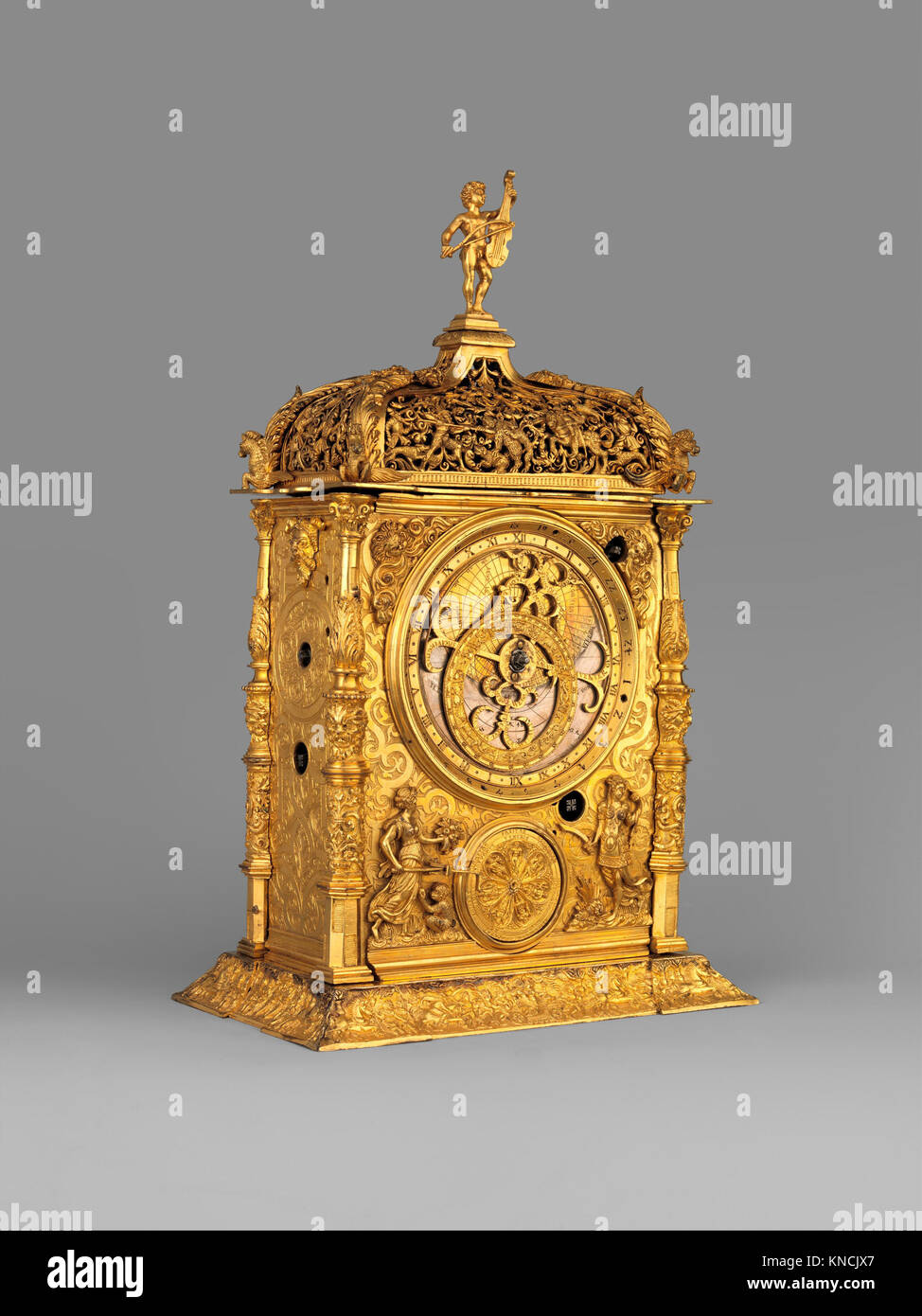 This astronomical table clock is a sophisticated timepiece featuring ...