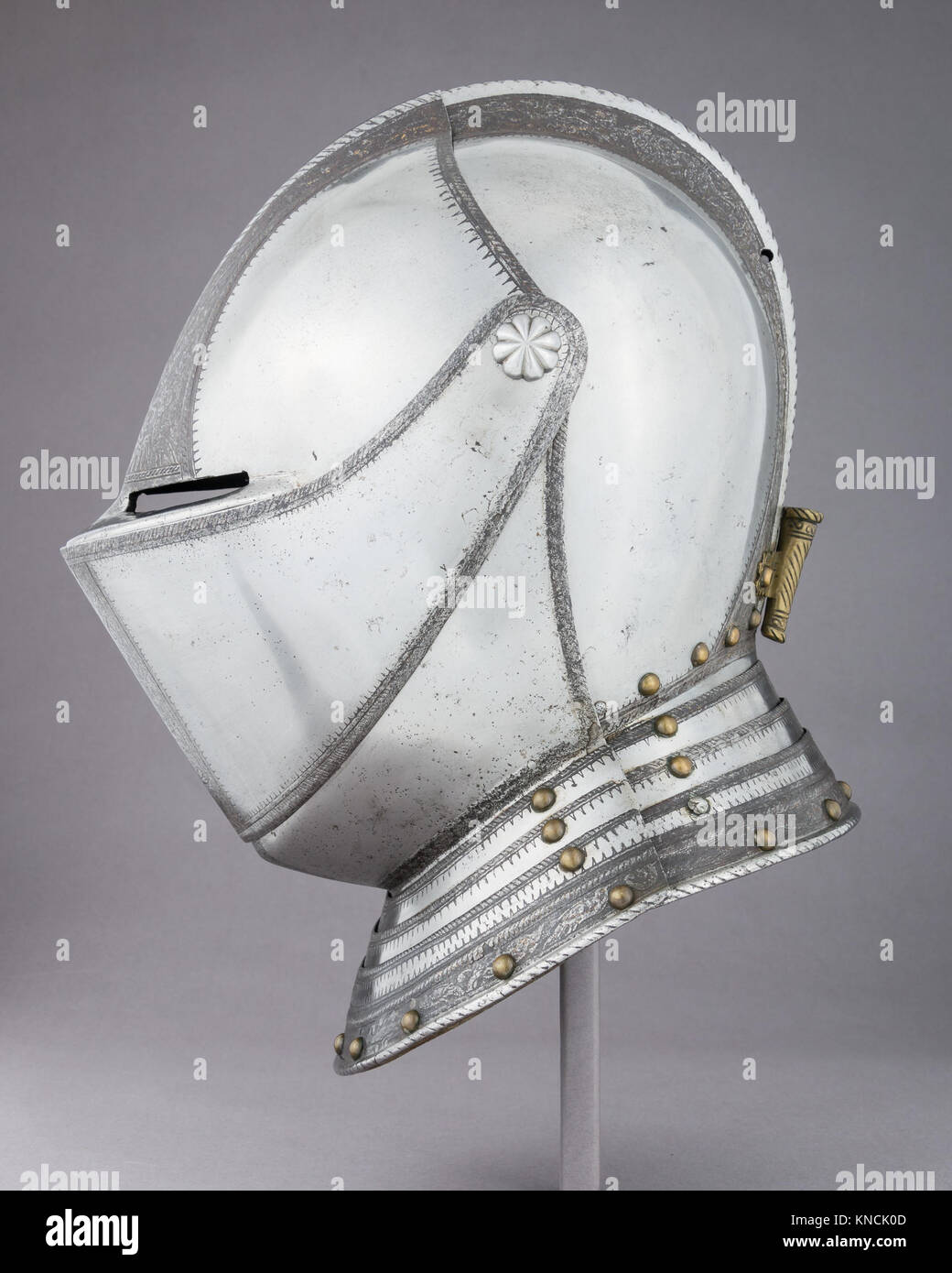 This armet, a type of medieval helmet, features a fully articulated ...
