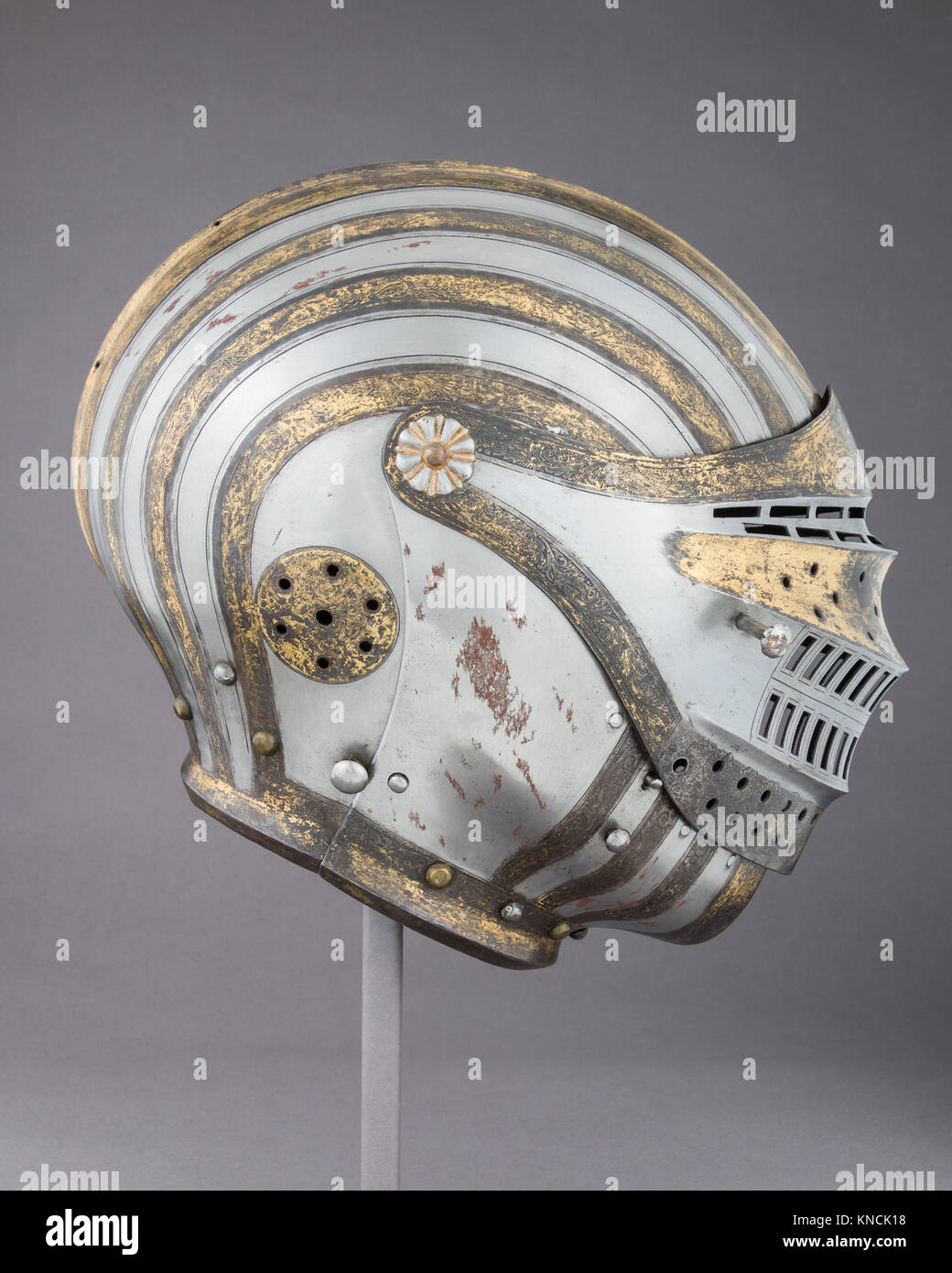 This close-helmet, styled in the fashion of the 16th century ...