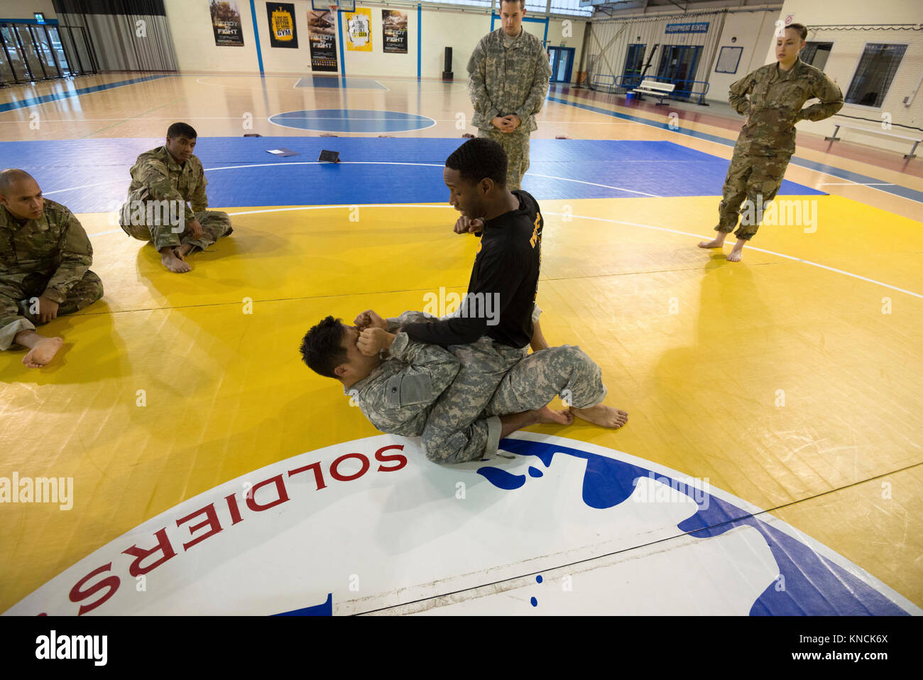 U.S. Army Staff Sgt. Romel Curtis, an Army combatives instructor ...