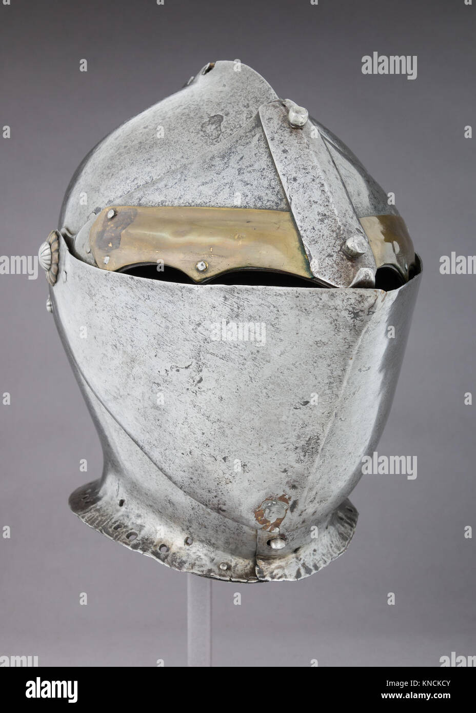 This MET armet helmet represents medieval military armor, illustrating ...