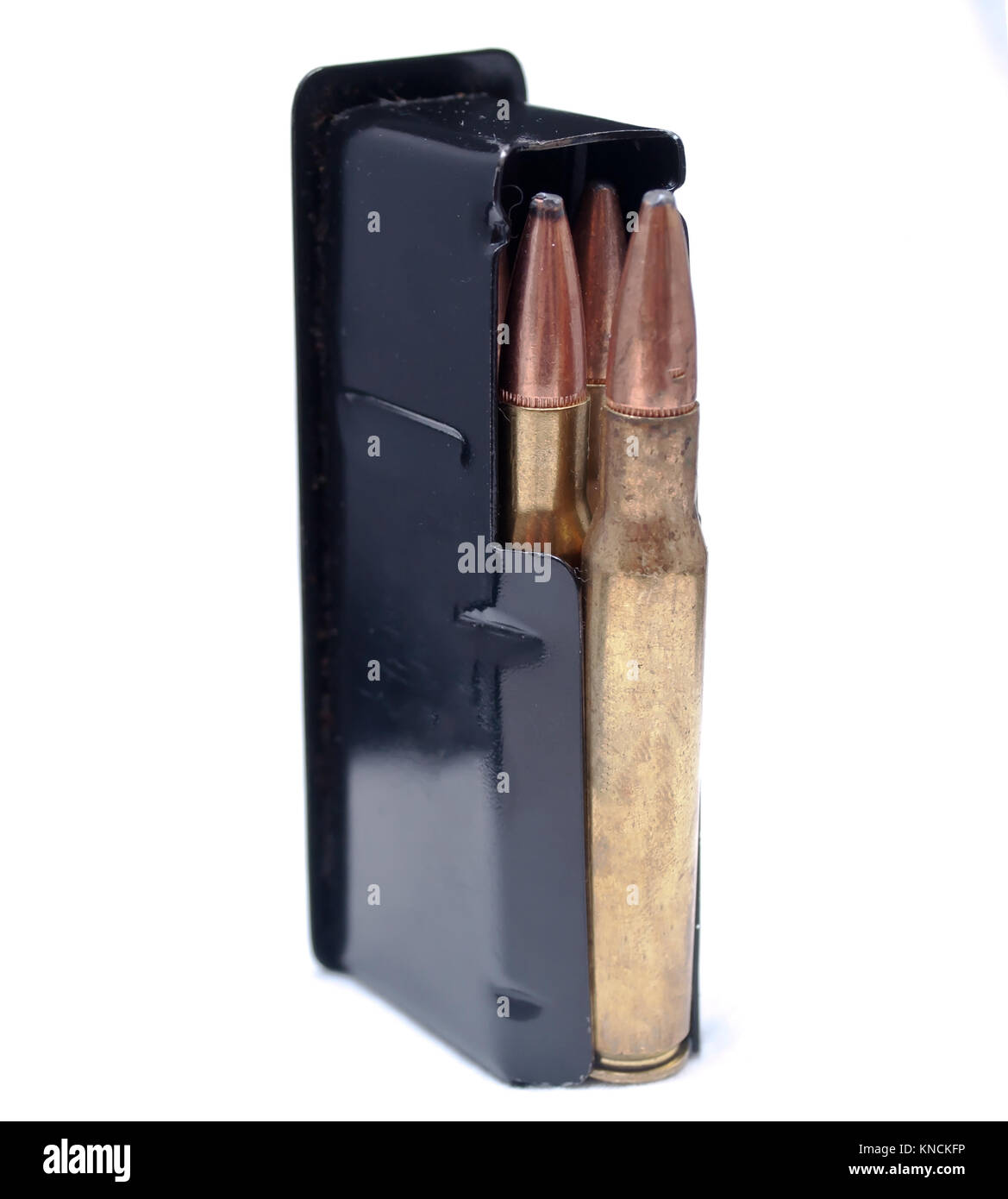 A loaded rifle magazine stood up on a white background Stock Photo - Alamy