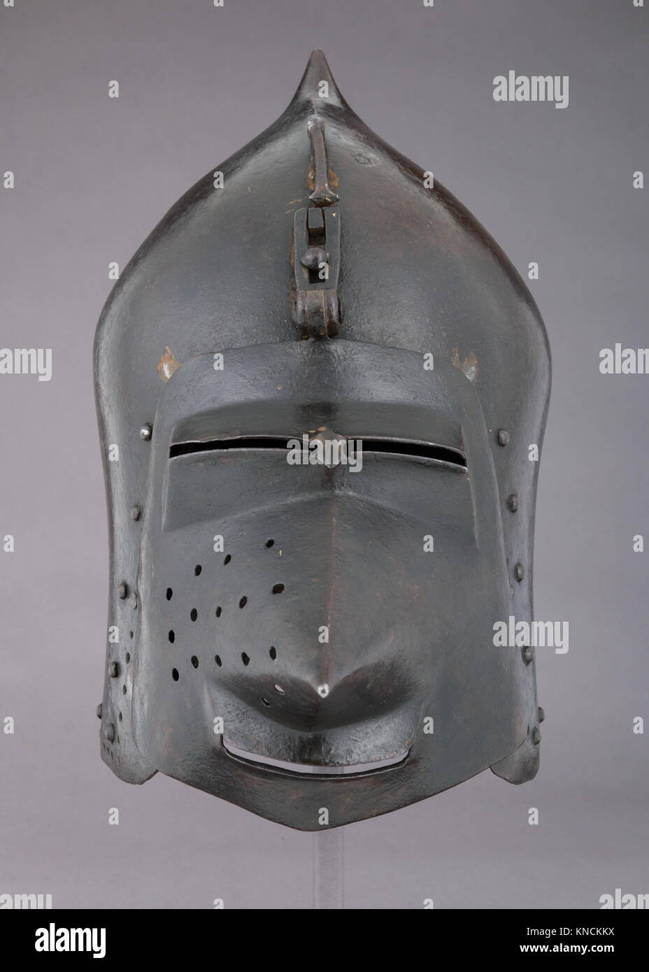 This basinet helmet, complete with a detachable visor, is an example of ...