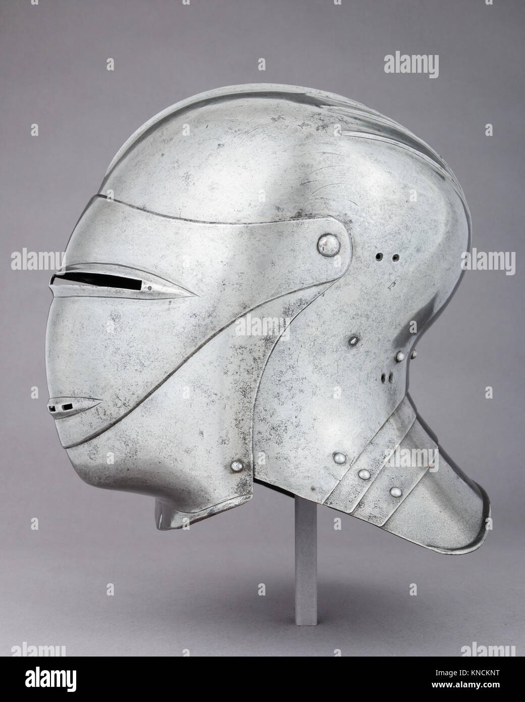 A medieval armet, a type of helmet used for protection in combat. It ...
