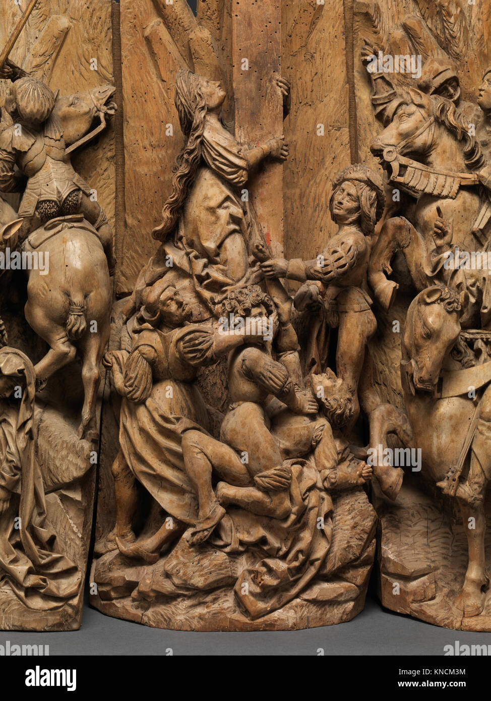 This artwork, depicting the Crucifixion, portrays a group scene central ...