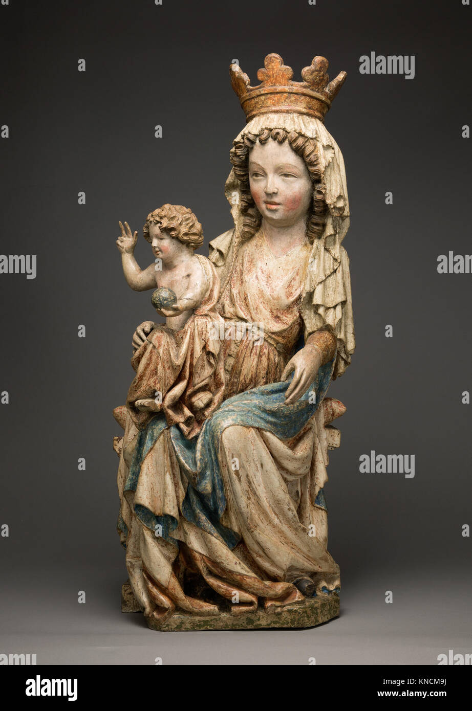 This 16th-century artwork depicts the Virgin Mary and Child seated on a ...